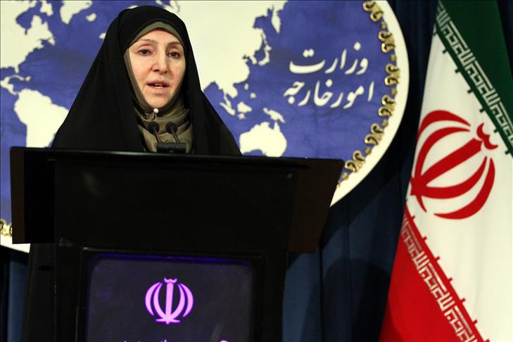 Iran "suspicious" of timing of war crimes photos ahead of Geneva II