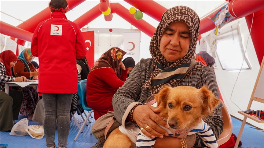 Quake survivor lives in tent with her dog who warned family just before ...
