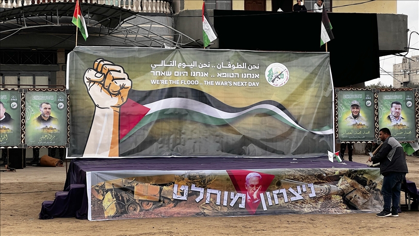 Hamas displays banner reading 'we are the next day' at site of Israeli ...