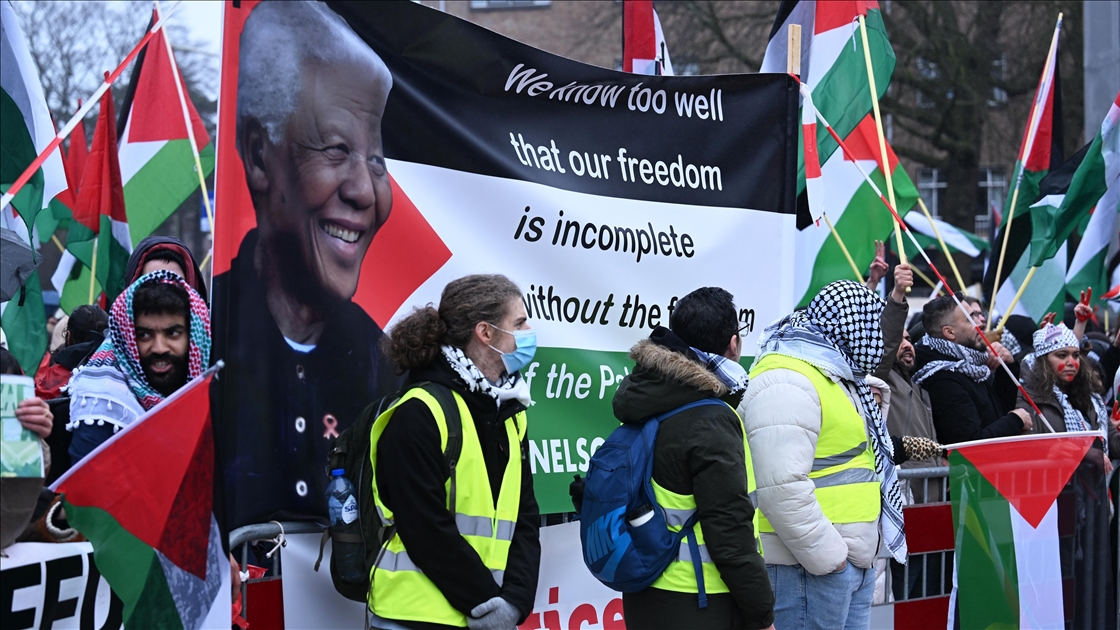 Palestine supporters demonstrate in front of the International Court of ...