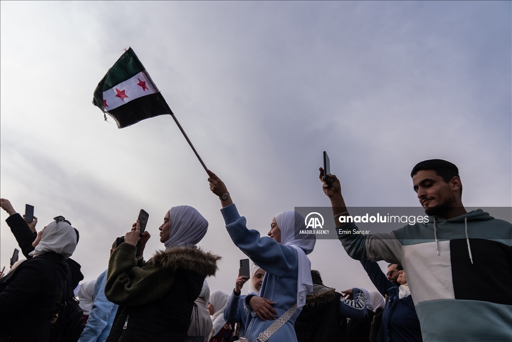 Syrians in Damascus celebrate the collapse of 61-Year Baath Regime