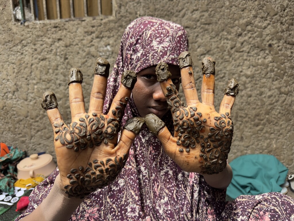 Women in Nigeria prepare for Eid al-Adha with traditional henna designs
