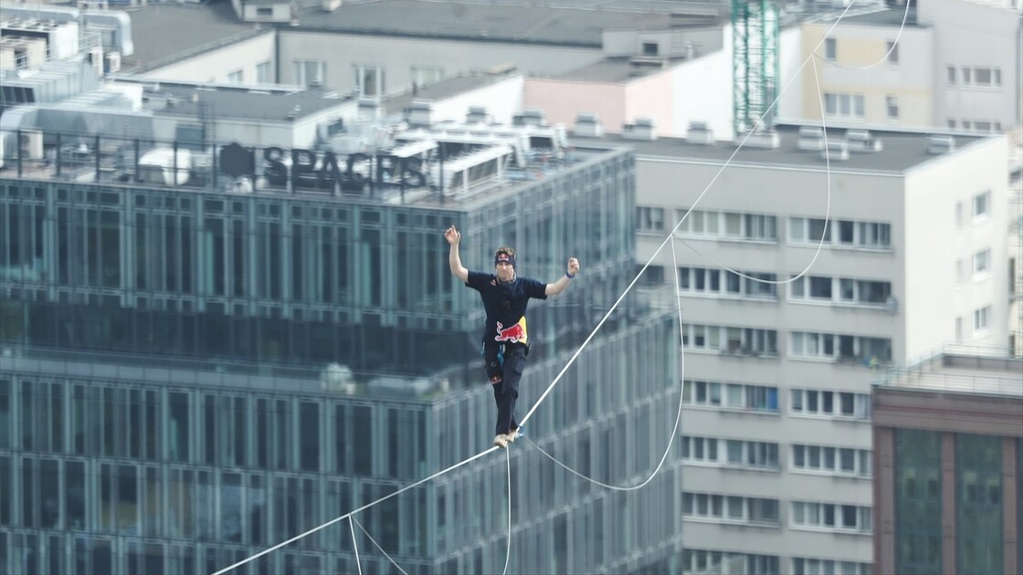 Estonian slackliner crosses line suspended between Poland's 2 tallest ...