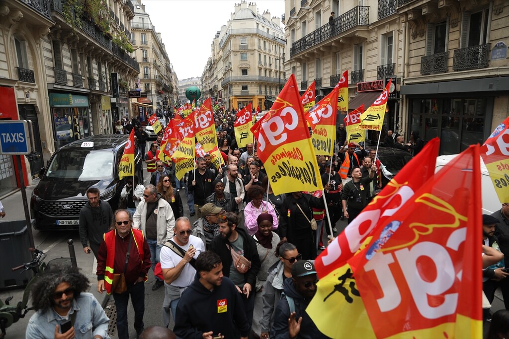 SNCF workers take part in a demonstration during a national strike in Paris