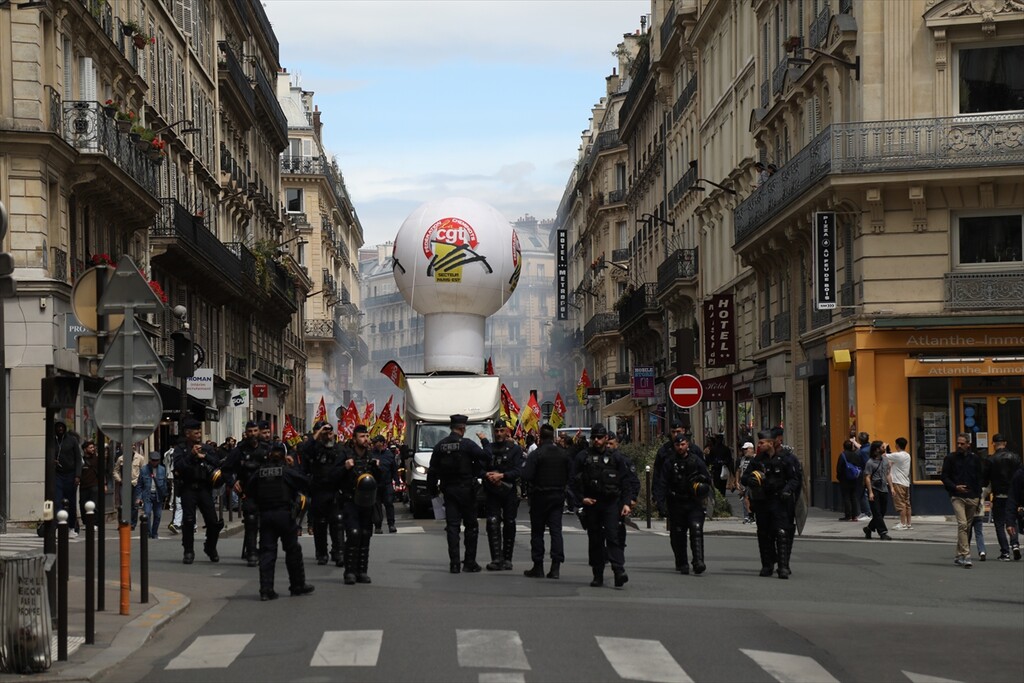 SNCF workers take part in a demonstration during a national strike in Paris