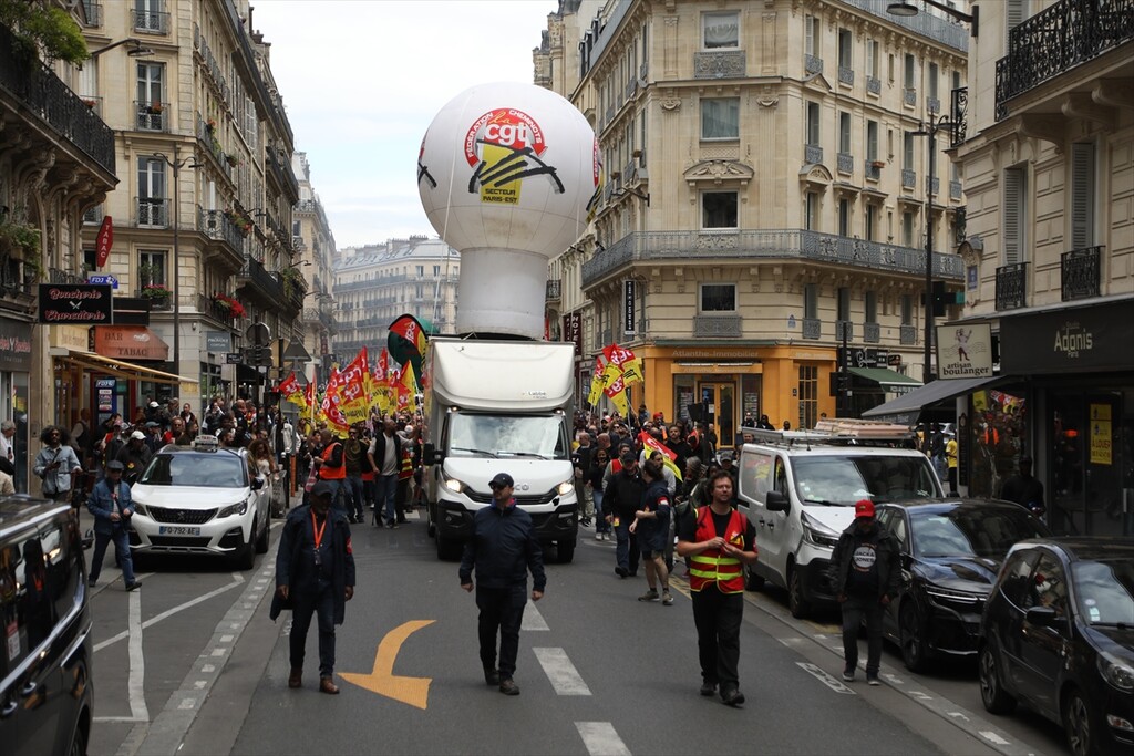SNCF workers take part in a demonstration during a national strike in Paris