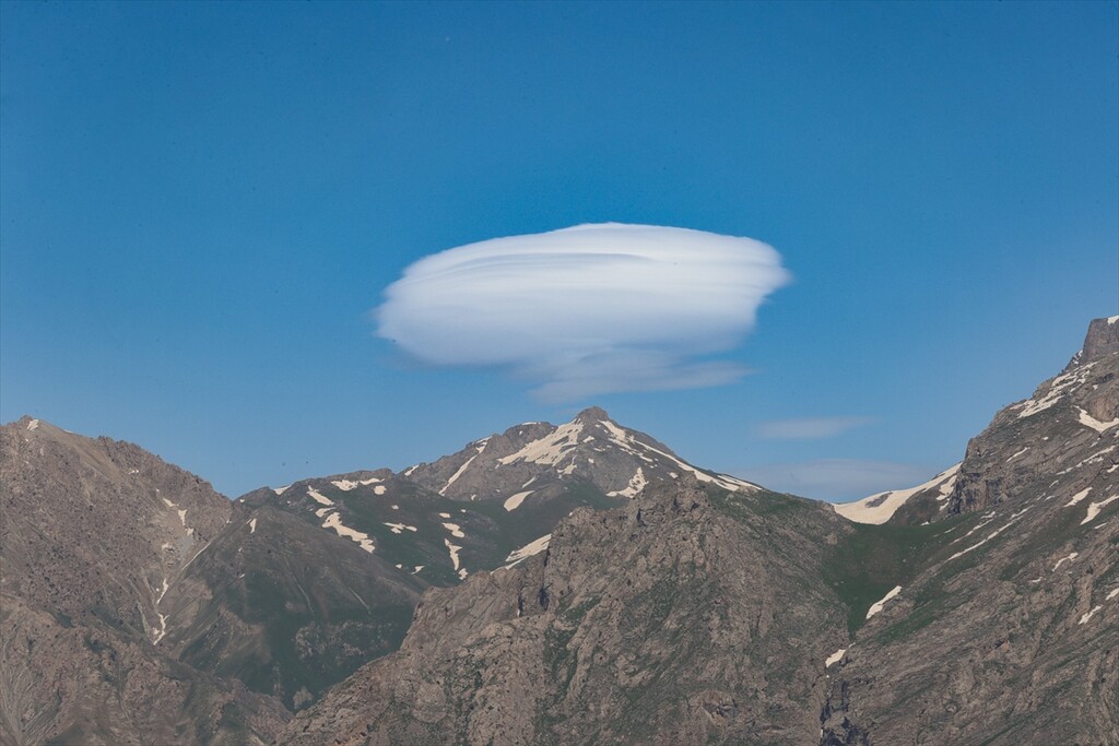 Lenticular clouds form over Mount Sumbul in eastern Turkiye